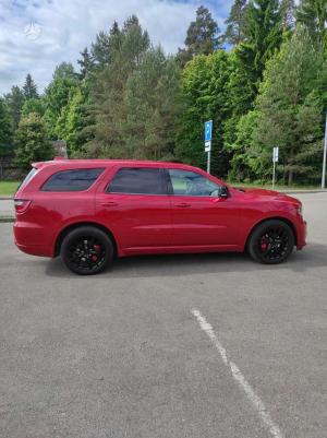 Red Dodge Durango 2015 in Kelme, with an engine capacity of 5.65 L and mileage of 285 thousand km for 15400 €, photo 6 on AUTOMOTO.COM.LV