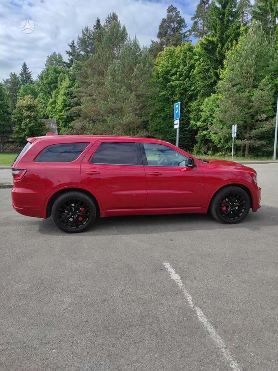 Red Dodge Durango 2015 in Kelme, with an engine capacity of 5.65 L and mileage of 285 thousand km for 15400 €, photo 6 on AUTOMOTO.COM.LV