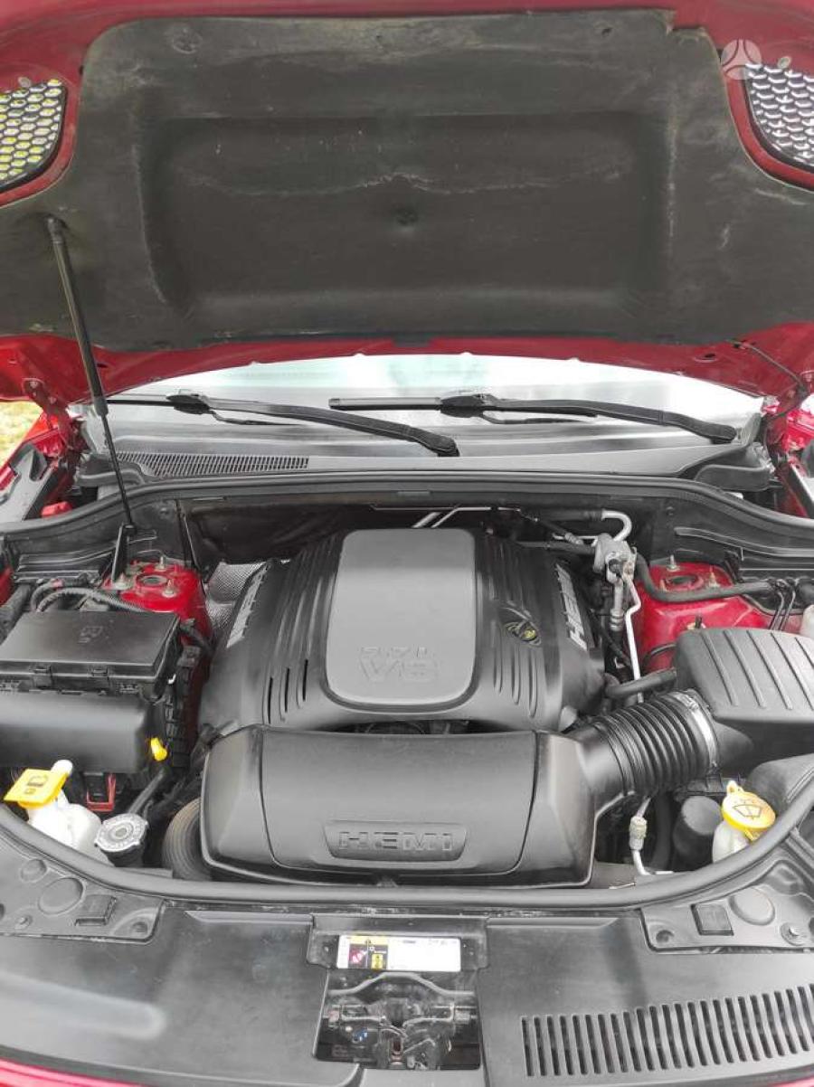 Red Dodge Durango 2015 in Kelme, with an engine capacity of 5.65 L and mileage of 285 thousand km for 15400 €, photo 8 on AUTOMOTO.COM.LV