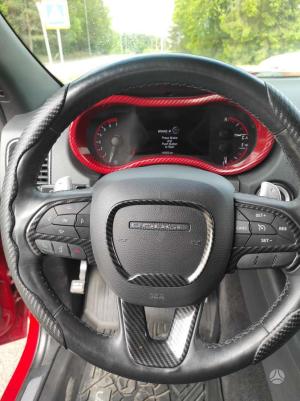 Red Dodge Durango 2015 in Kelme, with an engine capacity of 5.65 L and mileage of 285 thousand km for 15400 €, photo 9 on AUTOMOTO.COM.LV