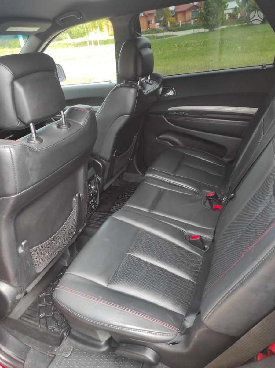 Red Dodge Durango 2015 in Kelme, with an engine capacity of 5.65 L and mileage of 285 thousand km for 15400 €, photo 12 on AUTOMOTO.COM.LV
