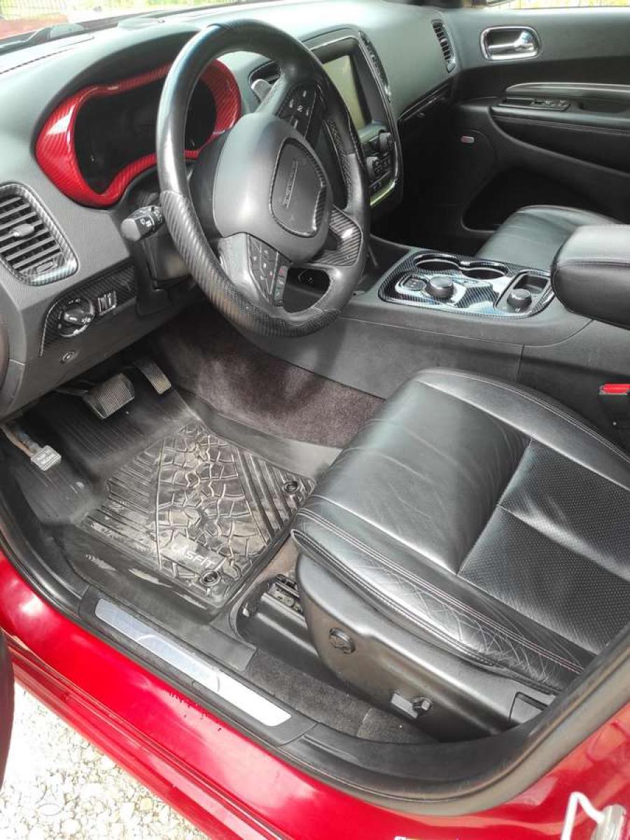 Red Dodge Durango 2015 in Kelme, with an engine capacity of 5.65 L and mileage of 285 thousand km for 15400 €, photo 15 on AUTOMOTO.COM.LV