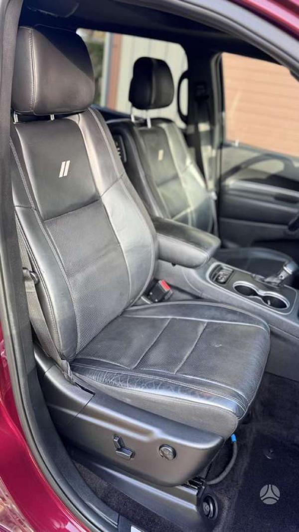 Red Dodge Durango 2018 in Varena, with an engine capacity of 3.60 L and mileage of 144 thousand km for 19965 €, photo 11 on AUTOMOTO.COM.LV