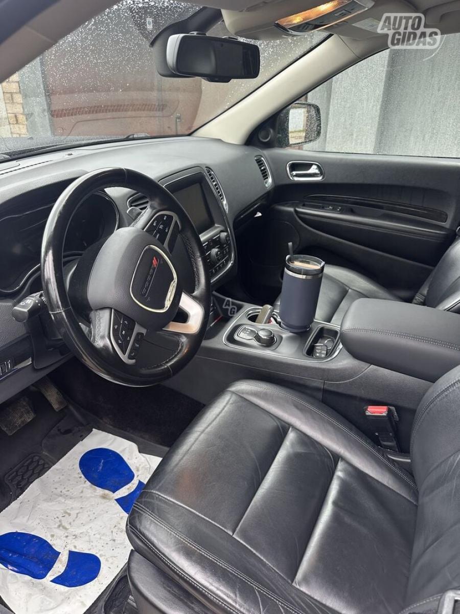 Violet Dodge Durango 2016 in Taurage, with an engine capacity of 3.60 L and mileage of 338 thousand km for 11700 €, photo 10 on AUTOMOTO.COM.LV