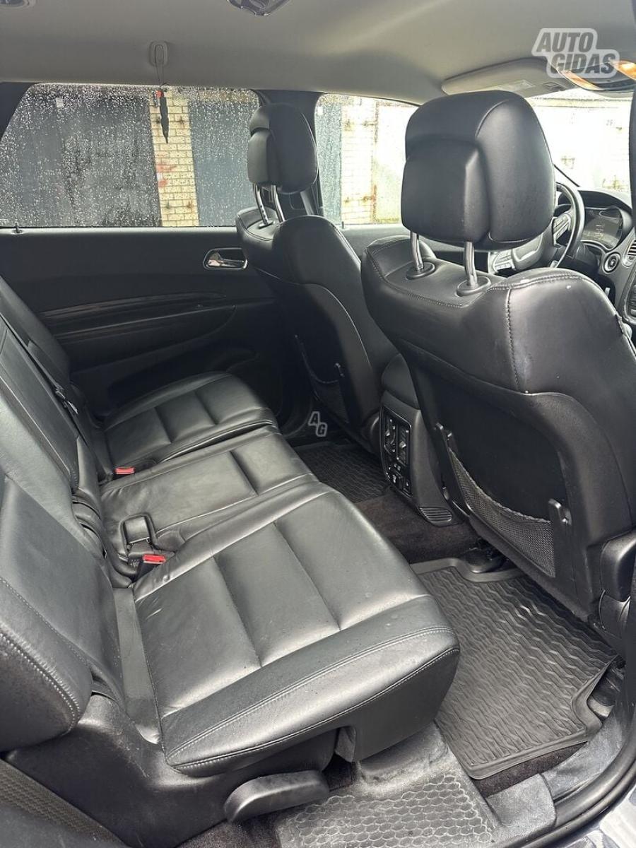 Violet Dodge Durango 2016 in Taurage, with an engine capacity of 3.60 L and mileage of 338 thousand km for 11700 €, photo 13 on AUTOMOTO.COM.LV
