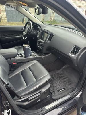 Violet Dodge Durango 2016 in Taurage, with an engine capacity of 3.60 L and mileage of 338 thousand km for 11700 €, photo 16 on AUTOMOTO.COM.LV