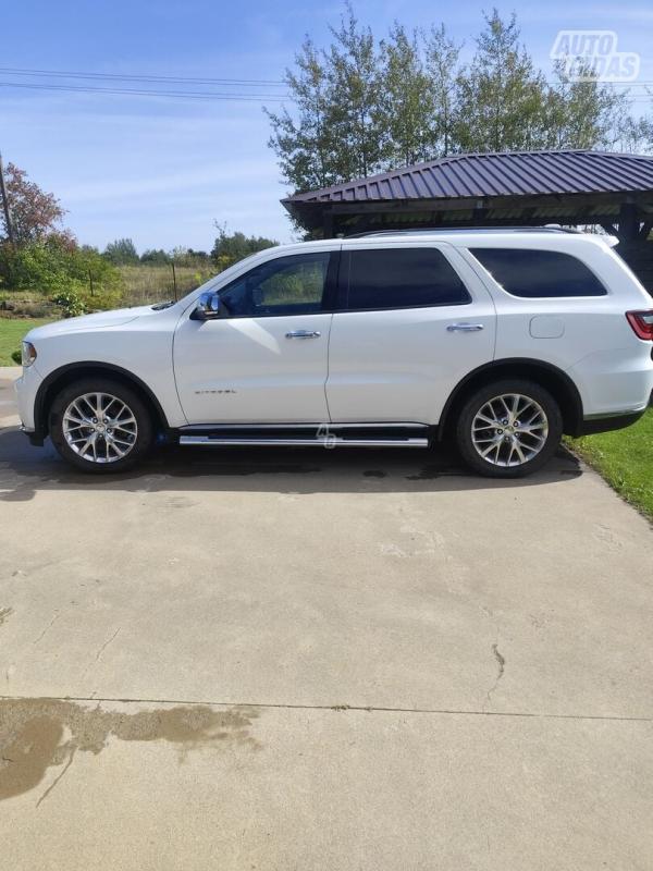 Dodge Durango 2014 Viļņa vietnē Balts Dodge Durango 2014 Viļņa, ar dzinēja tilpumu 3.60 L un nobraukumu 287 tūkst. km par 13000 €, foto 4 vietnē AUTOMOTO.COM.LV