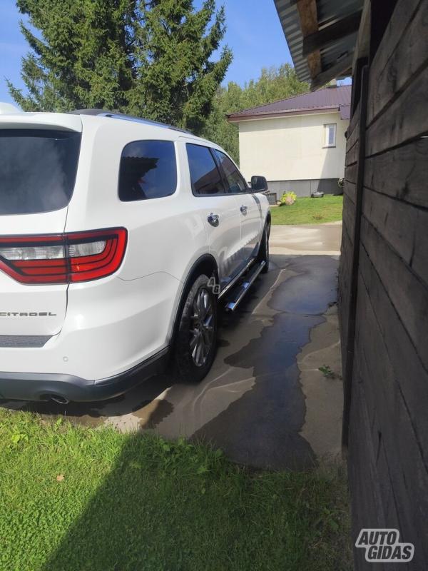 Dodge Durango 2014 Viļņa vietnē Balts Dodge Durango 2014 Viļņa, ar dzinēja tilpumu 3.60 L un nobraukumu 287 tūkst. km par 13000 €, foto 6 vietnē AUTOMOTO.COM.LV