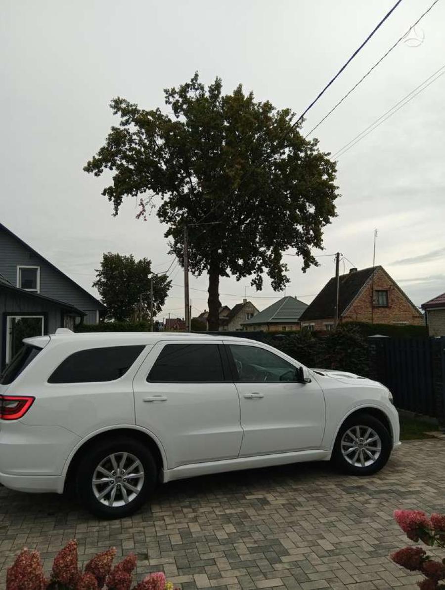 White Dodge Durango 2014 in Joniskis, with an engine capacity of 5.70 L and mileage of 192 thousand km for 14850 €, photo 5 on AUTOMOTO.COM.LV