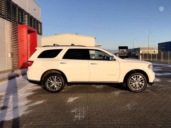 White Dodge Durango 2015 in Siauliai, with an engine capacity of 3.60 L and mileage of 100 thousand km for 10900 €, photo 4 on AUTOMOTO.COM.LV
