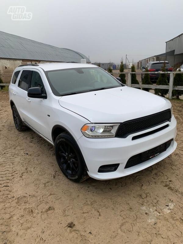White Dodge Durango 2015 in Kretinga, with an engine capacity of 3.60 L and mileage of 260 thousand km for 11999 €, photo 1 on AUTOMOTO.COM.LV