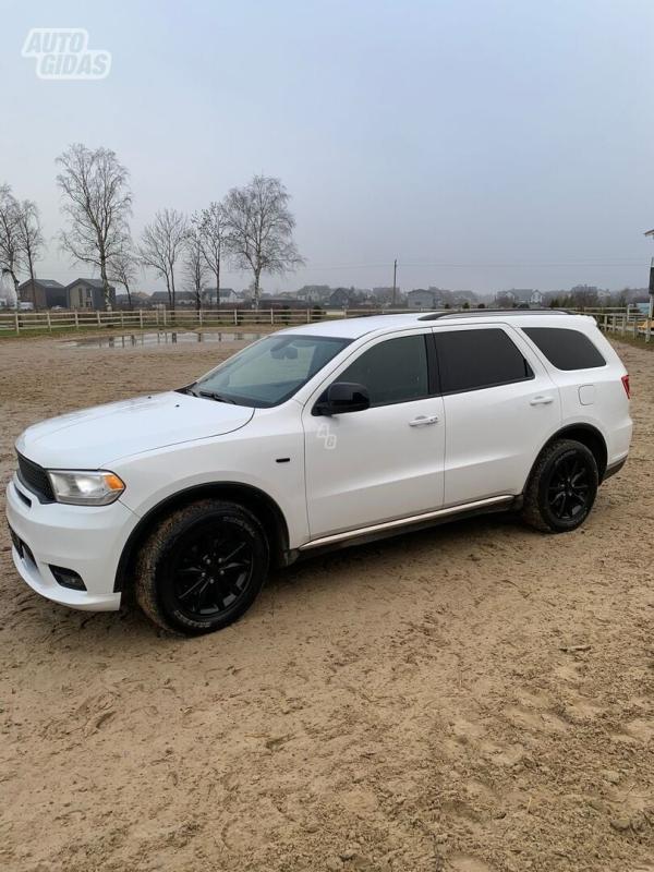 White Dodge Durango 2015 in Kretinga, with an engine capacity of 3.60 L and mileage of 260 thousand km for 11999 €, photo 6 on AUTOMOTO.COM.LV