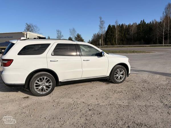 White Dodge Durango 2015 in Siauliai, with an engine capacity of 3.60 L and mileage of 241 thousand km for 14800 €, photo 5 on AUTOMOTO.COM.LV