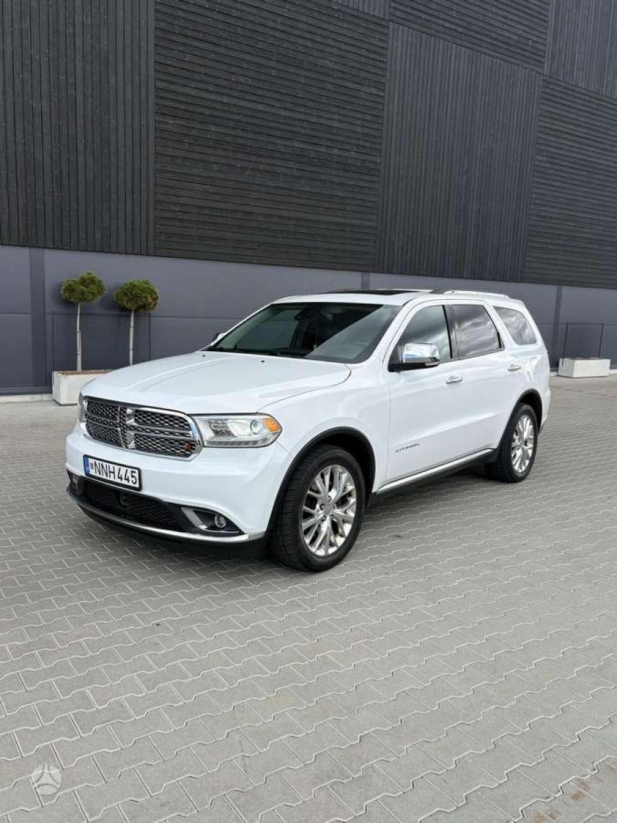 White Dodge Durango 2015 in Siauliai, with an engine capacity of 3.60 L and mileage of 221 thousand km for 13850 €, photo 1 on AUTOMOTO.COM.LV