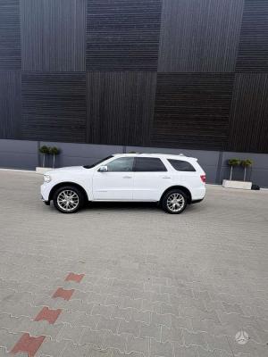 White Dodge Durango 2015 in Siauliai, with an engine capacity of 3.60 L and mileage of 221 thousand km for 13850 €, photo 7 on AUTOMOTO.COM.LV