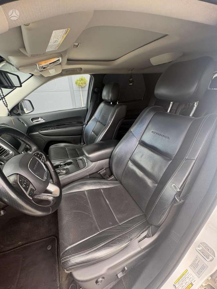 White Dodge Durango 2015 in Siauliai, with an engine capacity of 3.60 L and mileage of 221 thousand km for 13850 €, photo 11 on AUTOMOTO.COM.LV