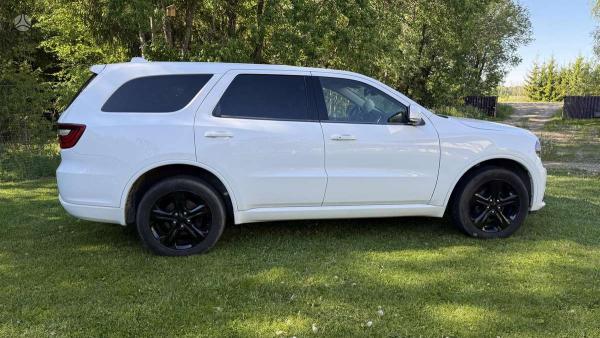 White Dodge Durango 2016 in Kretinga, with an engine capacity of 3.60 L and mileage of 204 thousand km for 14500 €, photo 3 on AUTOMOTO.COM.LV