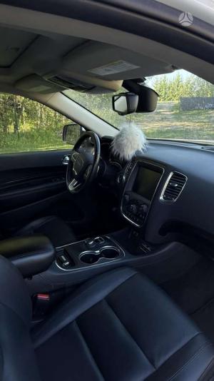 White Dodge Durango 2016 in Kretinga, with an engine capacity of 3.60 L and mileage of 204 thousand km for 14500 €, photo 15 on AUTOMOTO.COM.LV