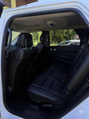 White Dodge Durango 2016 in Kretinga, with an engine capacity of 3.60 L and mileage of 204 thousand km for 14500 €, photo 17 on AUTOMOTO.COM.LV