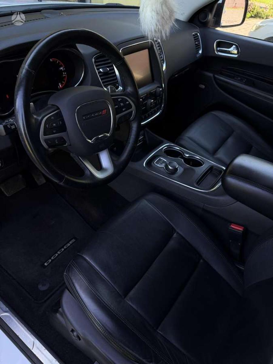 White Dodge Durango 2016 in Kretinga, with an engine capacity of 3.60 L and mileage of 204 thousand km for 14500 €, photo 18 on AUTOMOTO.COM.LV