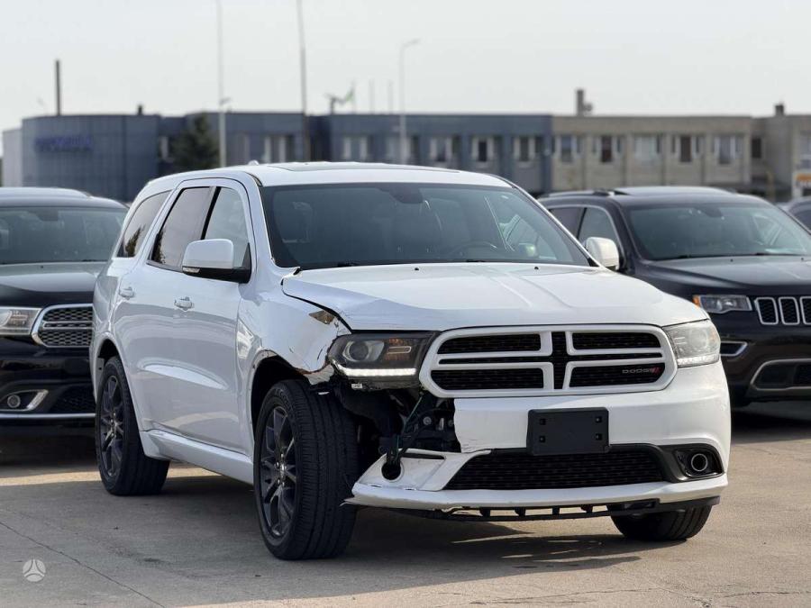 White Dodge Durango 2016 in Siauliai, with an engine capacity of 5.65 L and mileage of 202 thousand km for 9900 €, photo 1 on AUTOMOTO.COM.LV