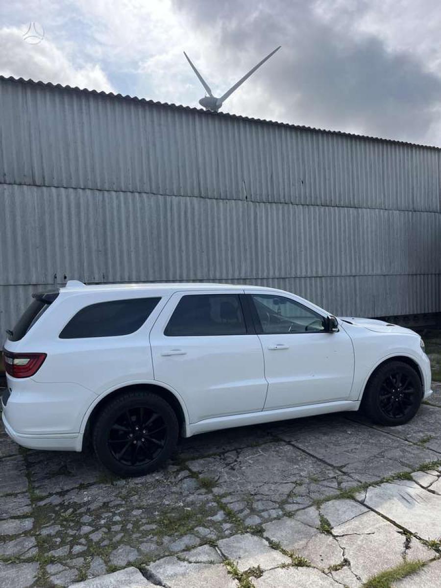 White Dodge Durango 2017 in Klaipeda, with an engine capacity of 5.65 L and mileage of 220 thousand km for 14900 €, photo 6 on AUTOMOTO.COM.LV