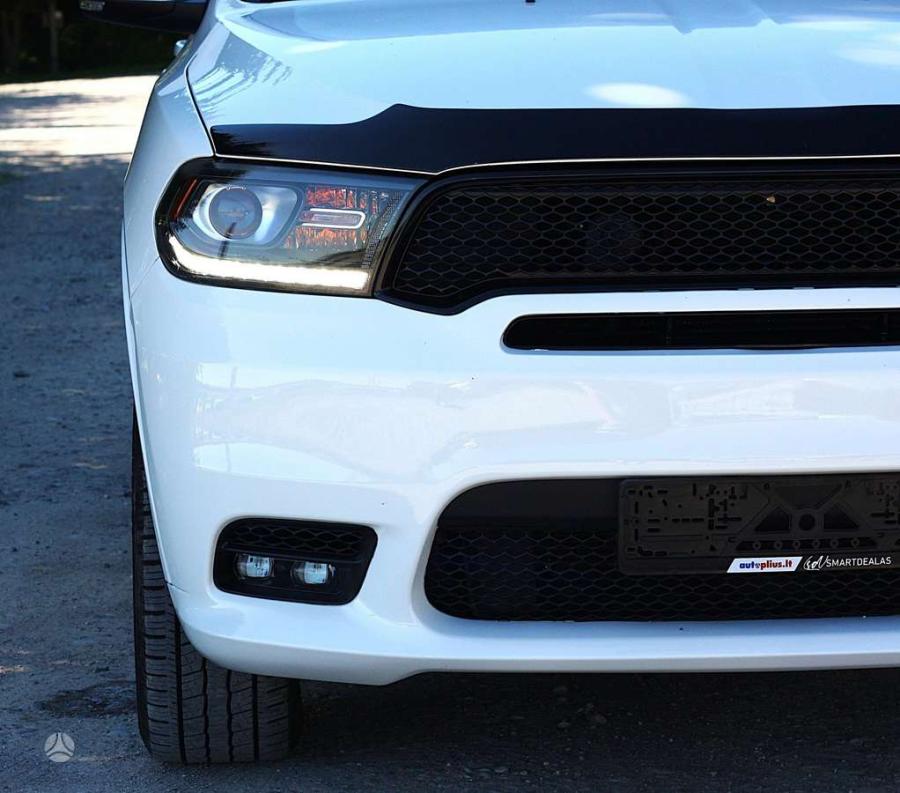 White Dodge Durango 2018 in Kretinga, with an engine capacity of 3.60 L and mileage of 146 thousand km for 17499 €, photo 5 on AUTOMOTO.COM.LV