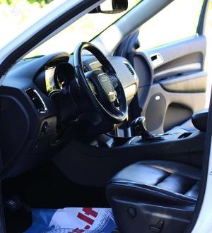 White Dodge Durango 2018 in Kretinga, with an engine capacity of 3.60 L and mileage of 146 thousand km for 17499 €, photo 23 on AUTOMOTO.COM.LV