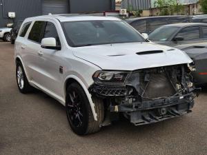 White Dodge Durango 2018 in Vilnius, with an engine capacity of 6.42 L and mileage of 187 thousand km for 19999 €, photo  on AUTOMOTO.COM.LV