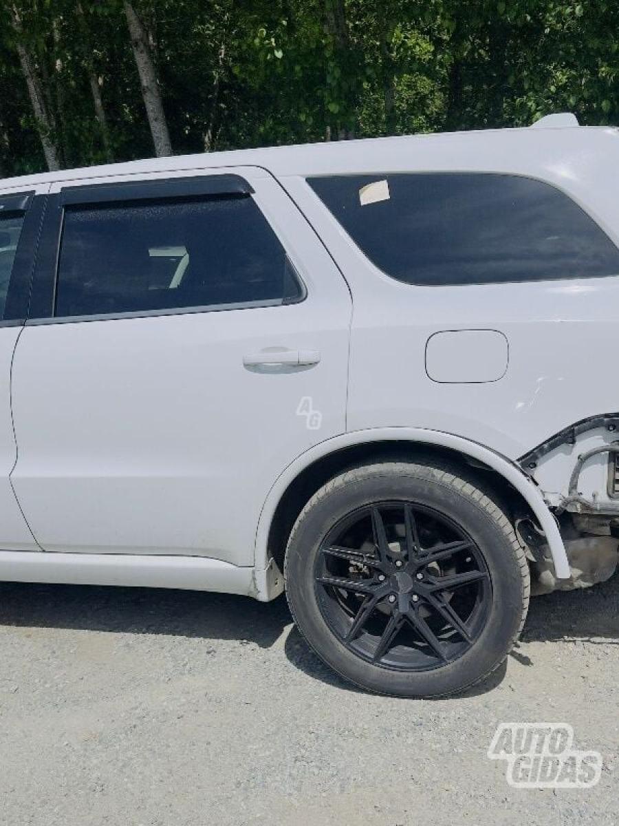 White Dodge Durango 2019 in Alytus, with an engine capacity of 5.70 L and mileage of 184 thousand km for 9800 €, photo 13 on AUTOMOTO.COM.LV