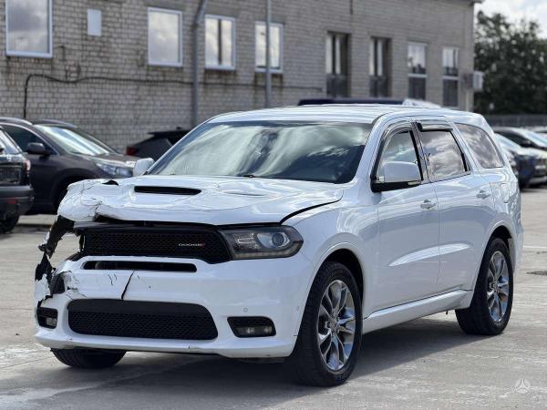 White Dodge Durango 2019 in Siauliai, with an engine capacity of 5.65 L and mileage of 214 thousand km for 11900 €, photo 1 on AUTOMOTO.COM.LV