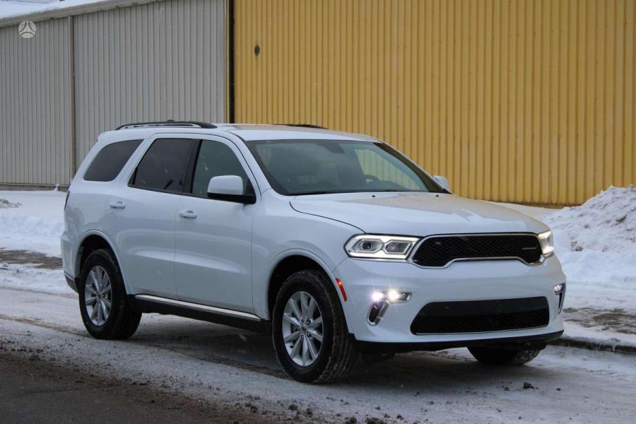 White Dodge Durango 2022 in Vilnius, with an engine capacity of 3.60 L and mileage of 82 thousand km for 24999 €, photo 1 on AUTOMOTO.COM.LV