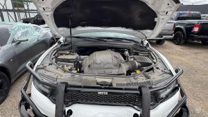 White Dodge Durango 2023 in Ukmerge, with an engine capacity of 5.65 L and mileage of 63 thousand km for 11899 €, photo 4 on AUTOMOTO.COM.LV