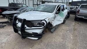 White Dodge Durango 2023 in Ukmerge, with an engine capacity of 5.65 L and mileage of 63 thousand km for 11899 €, photo 5 on AUTOMOTO.COM.LV