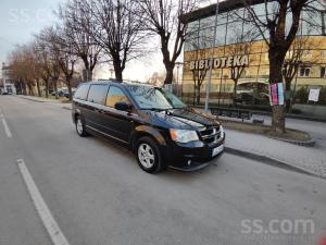 Black Dodge Grand Caravan 2011 in Tukums, with an engine capacity of 3.60 L and mileage of 302 thousand km for 3500 €, photo  on AUTOMOTO.COM.LV