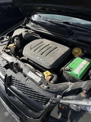 Black Dodge Grand Caravan 2015 in Telschi, with an engine capacity of 3.60 L and mileage of 204 thousand km for 7000 €, photo 24 on AUTOMOTO.COM.LV