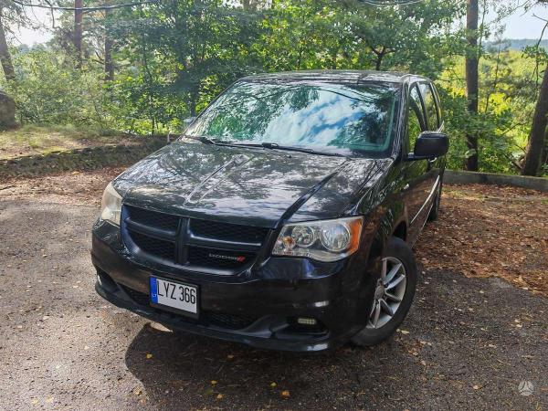 Black Dodge Grand Caravan 2016 in Vilnius, with an engine capacity of 3.61 L and mileage of 253 thousand km for 8400 €, photo 1 on AUTOMOTO.COM.LV
