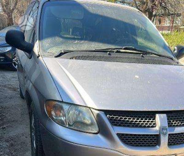 Pelēks Dodge Grand Caravan 2005 Viļņa, ar dzinēja tilpumu 3.30 L un nobraukumu 0 tūkst. km par 1331 €, foto 1 vietnē AUTOMOTO.COM.LV