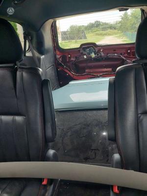 Red Dodge Grand Caravan 2019 in Kaunas, with an engine capacity of 0.00 L and mileage of 170 thousand km for 4500 €, photo 9 on AUTOMOTO.COM.LV