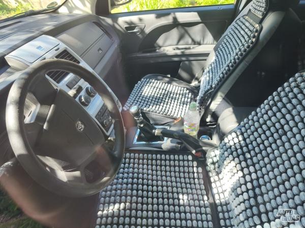 Melns Dodge Journey 2008 Viļņa, ar dzinēja tilpumu 2.00 L un nobraukumu 244 tūkst. km par 3500 €, foto 4 vietnē AUTOMOTO.COM.LV