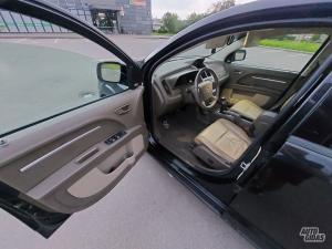 Melns Dodge Journey 2009 Radviliškis, ar dzinēja tilpumu 2.00 L un nobraukumu 320 tūkst. km par 3200 €, foto 14 vietnē AUTOMOTO.COM.LV