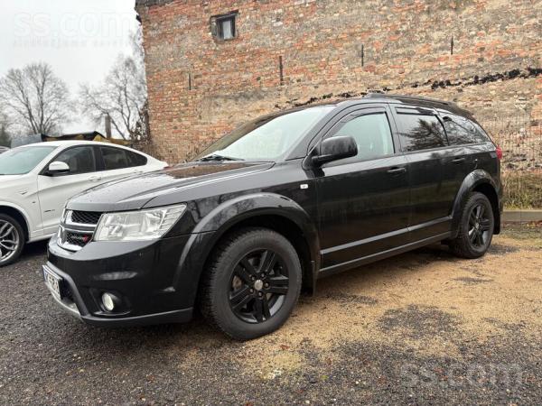 Black Dodge Journey 2013 in Riga, with an engine capacity of 2.00 L and mileage of 0 thousand km for 5300 €, photo 2 on AUTOMOTO.COM.LV