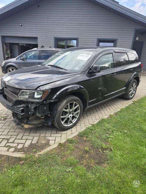Dodge Journey 2017 KaiÅ”iadorys vietnÄ Melns Dodge Journey 2017 KaiÅ”iadorys, ar dzinÄja tilpumu 3.60 L un nobraukumu 200 tÅ«kst. km par 5600 ā¬, foto 8 vietnÄ AUTOMOTO.COM.LV