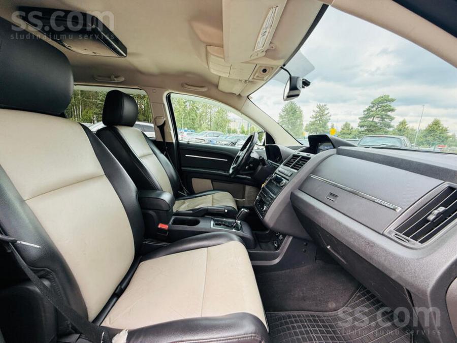 Black Dodge Journey 2009 in Riga, with an engine capacity of 2.00 L and mileage of 0 thousand km for 3750 €, photo 9 on AUTOMOTO.COM.LV