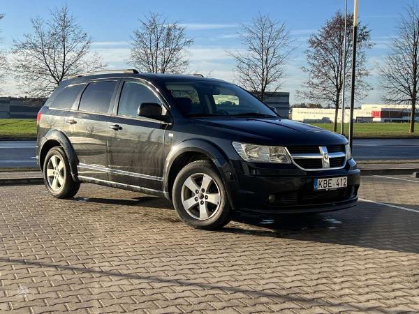 Black Dodge Journey 2010 in Panevezys, with an engine capacity of 2.00 L and mileage of 220 thousand km for 3500 €, photo 1 on AUTOMOTO.COM.LV