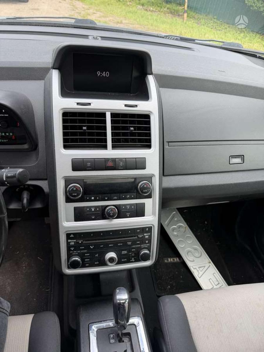 Pelēks Dodge Journey 2011 Kauņa, ar dzinēja tilpumu 2.00 L un nobraukumu 189 tūkst. km par 1499 €, foto 14 vietnē AUTOMOTO.COM.LV