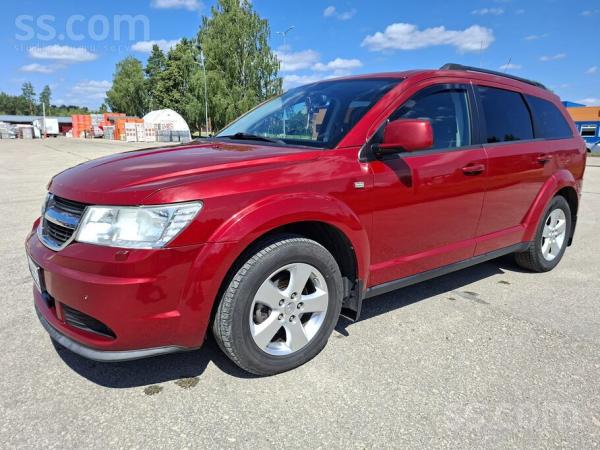 Red Dodge Journey 2010 in Valmiera, with an engine capacity of 2.00 L and mileage of 241 thousand km for 3000 €, photo 1 on AUTOMOTO.COM.LV