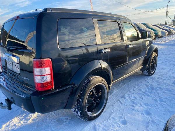 Black Dodge Nitro 2007 in Panevezys, with an engine capacity of 2.80 L and mileage of 220 thousand km for 4600 €, photo 5 on AUTOMOTO.COM.LV