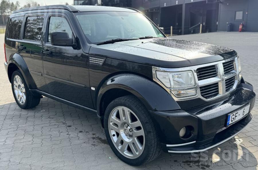 Black Dodge Nitro 2007 in Riga, with an engine capacity of 2.80 L and mileage of 315 thousand km for 3750 €, photo 1 on AUTOMOTO.COM.LV