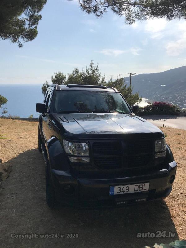 Black Dodge Nitro 2008 in Tallinn, with an engine capacity of 2.80 L and mileage of 166 thousand km for 6995 €, photo 1 on AUTOMOTO.COM.LV